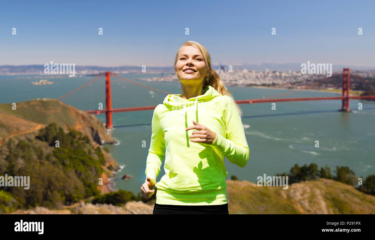 Female running over bridge hi-res stock photography and images - Alamy