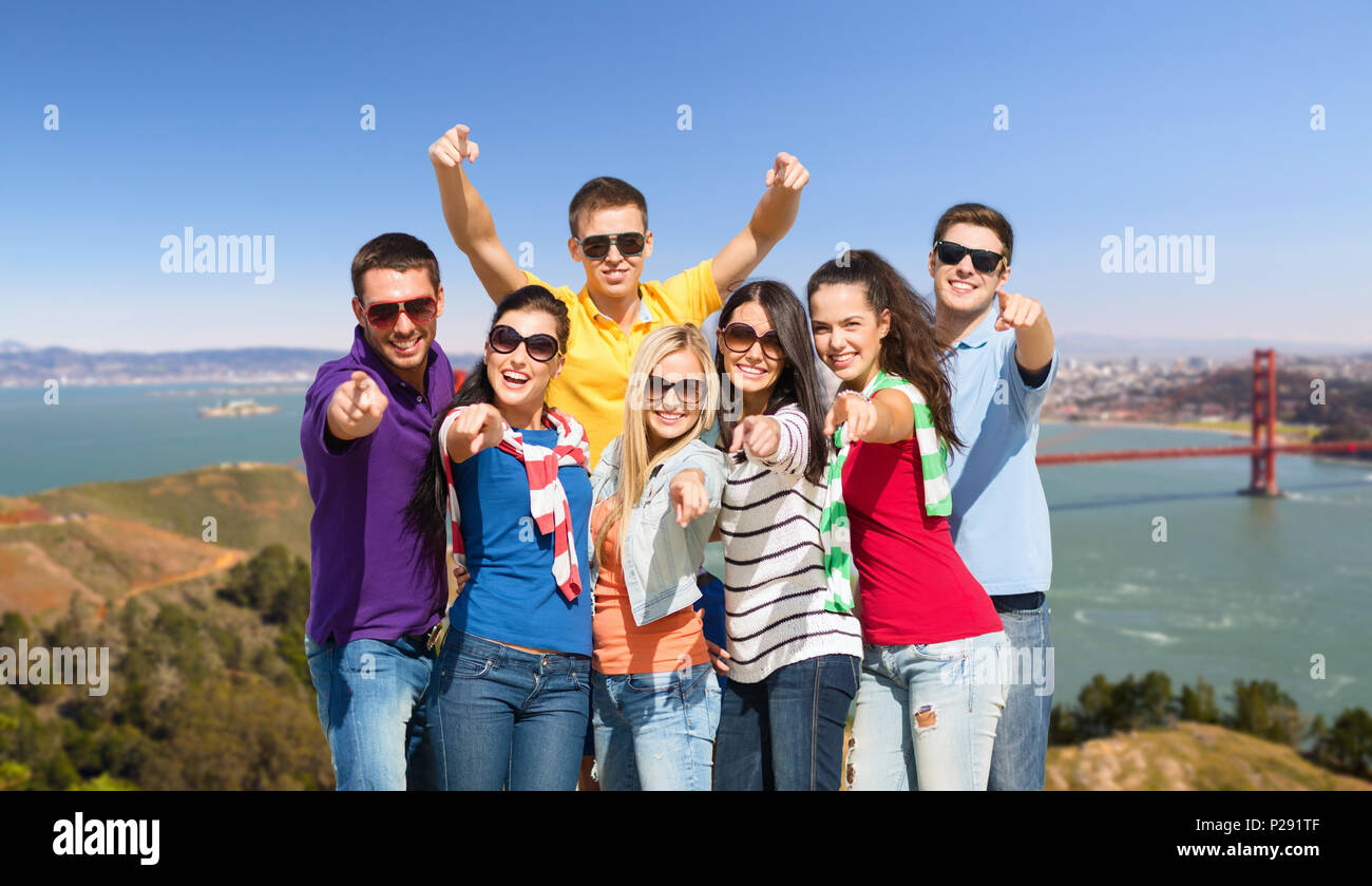 group of happy friends over golden gate bridge Stock Photo - Alamy