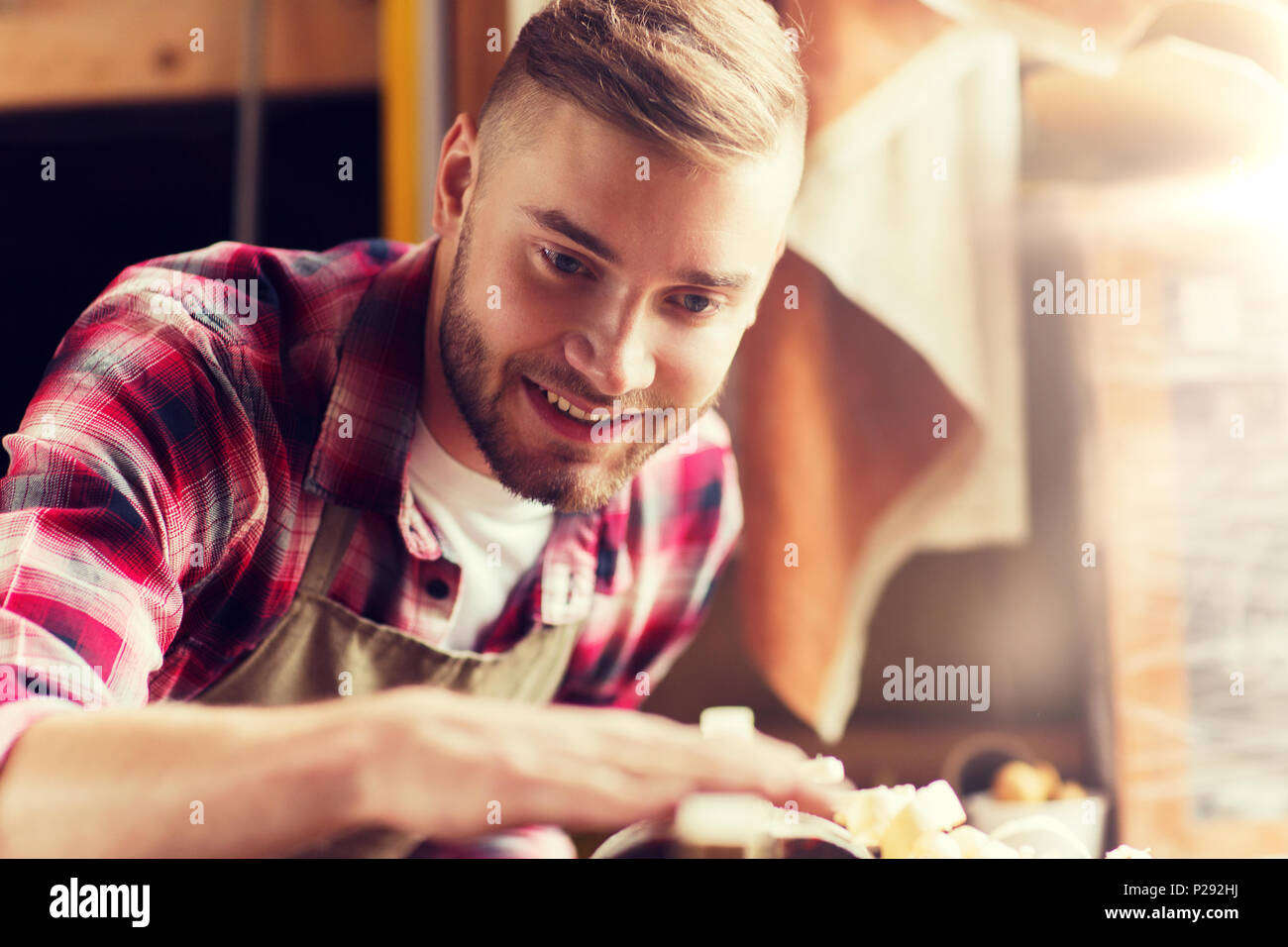 carpenter working with wood plank at workshop Stock Photo - Alamy