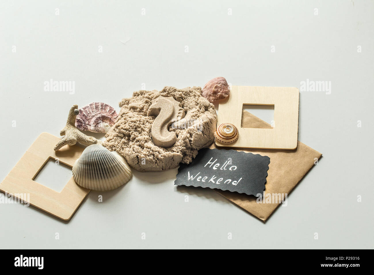 Hello weekend, the concept of relaxing on the beach, white background ...