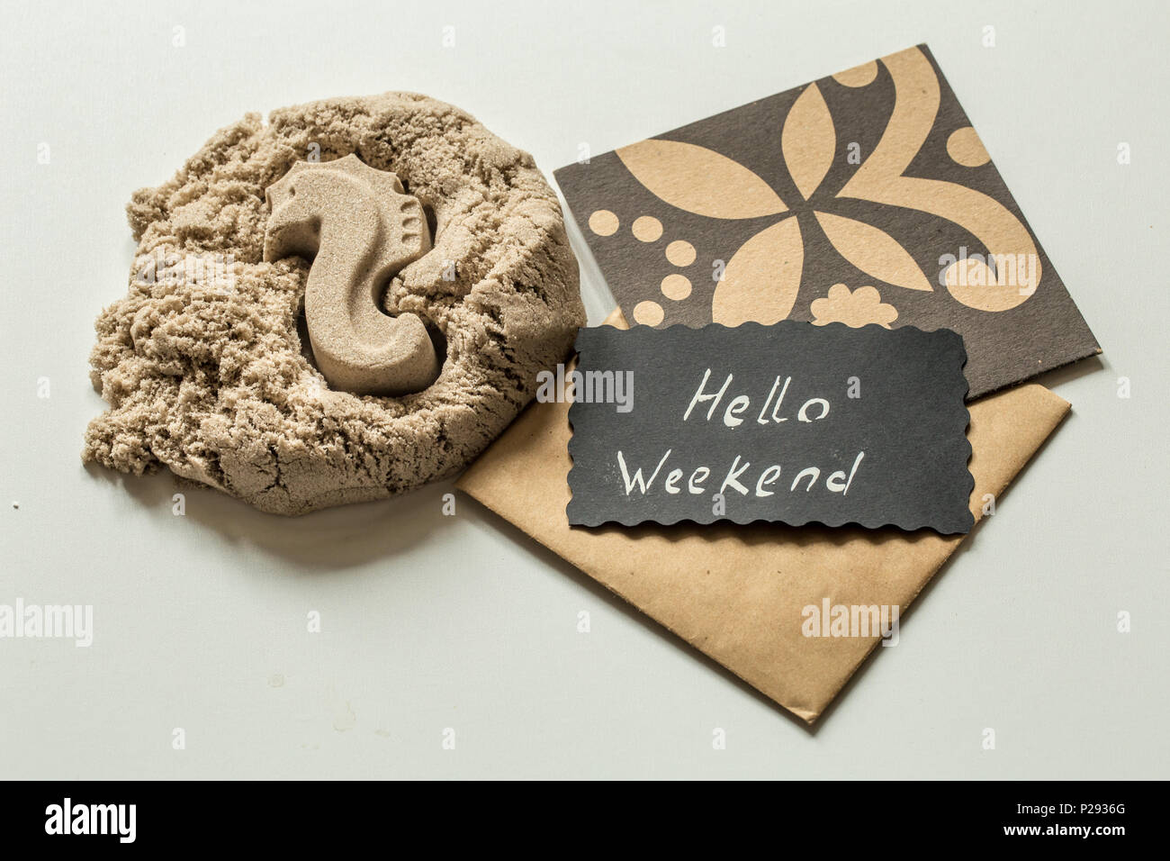 Hello weekend, the concept of relaxing on the beach, white background ...