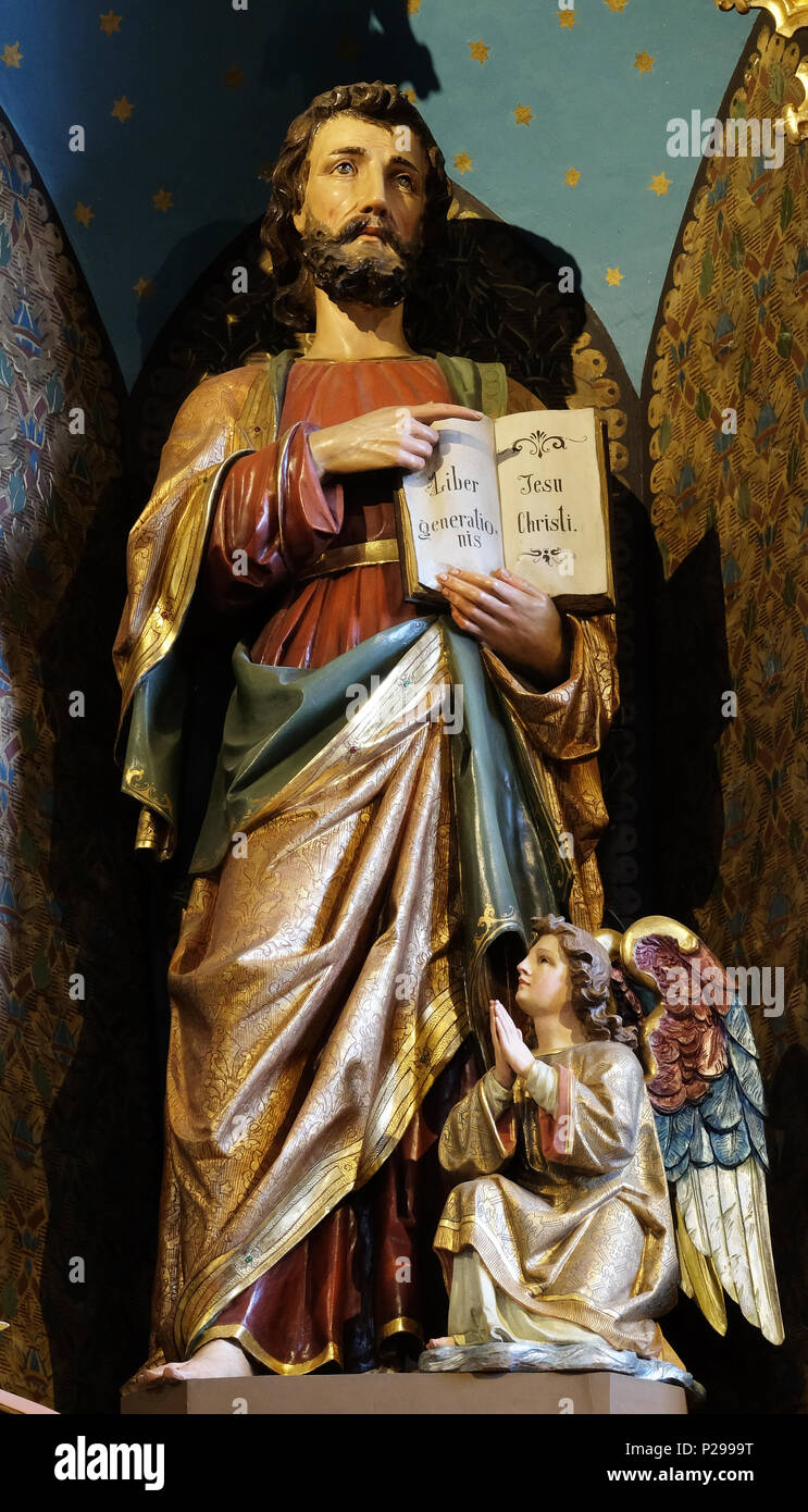 St. Matthew the Evangelist statue on the main altar in the church of ...