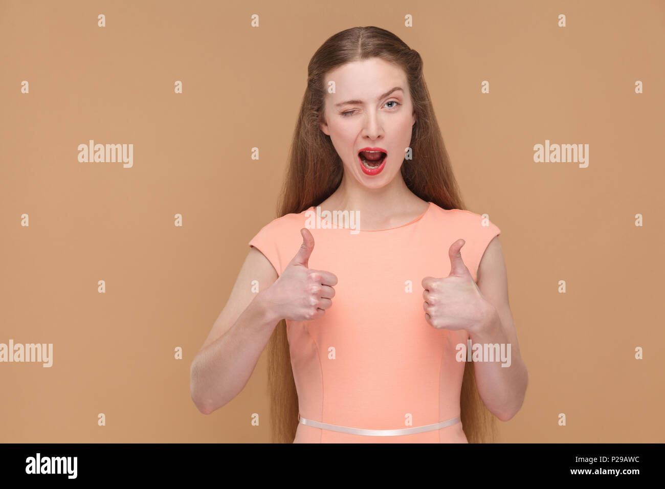 Woman feeling good portrait face thumb hi-res stock photography and ...