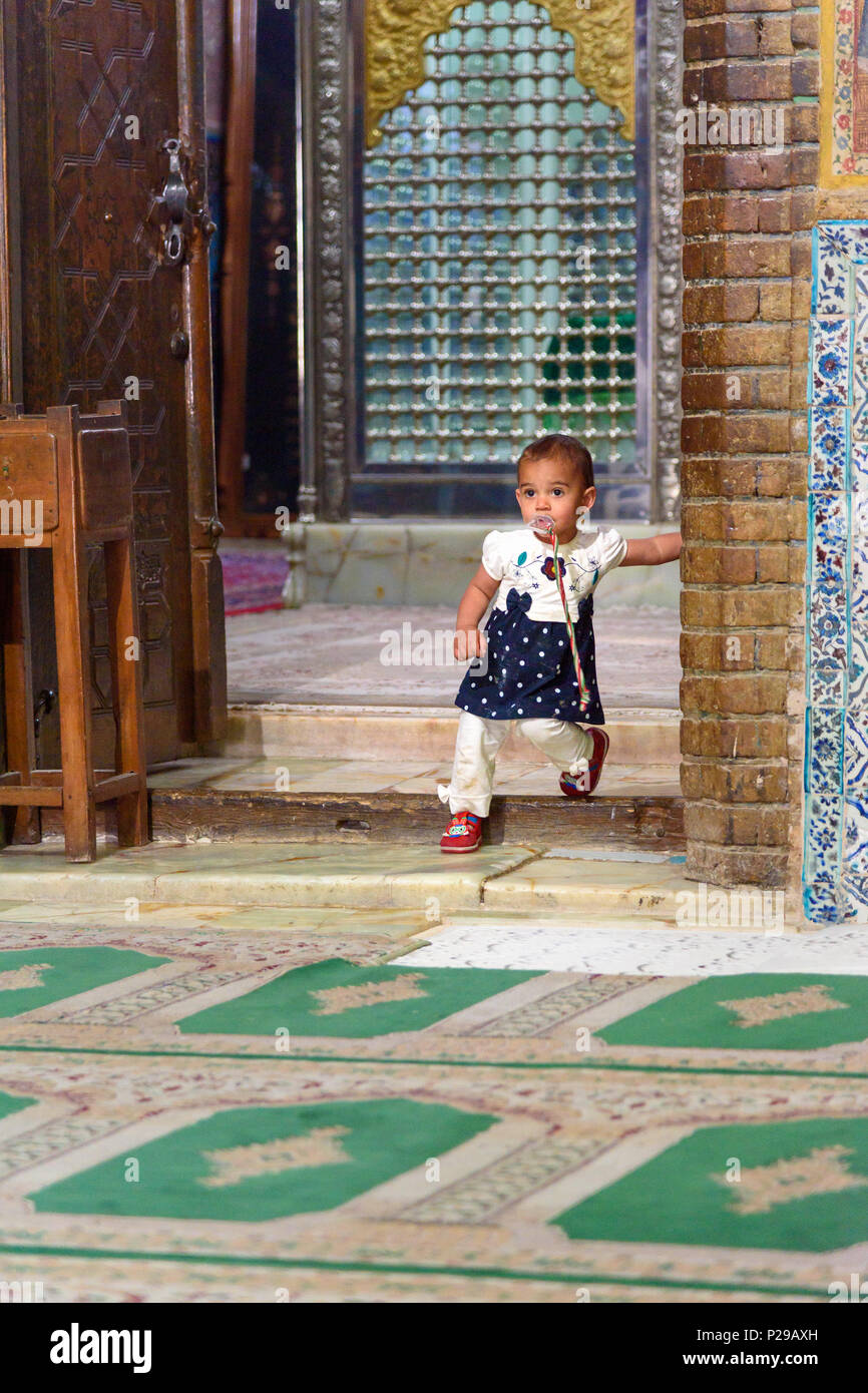 Isfahan, Iran - March 21, 2018: Iranian child inside of Mausoleum of ...