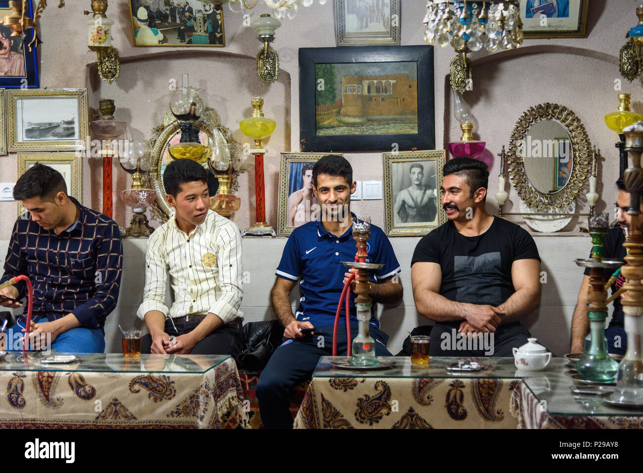 Isfahan, Iran - March 21, 2018: Iranian men smoke hookah in tea house ...