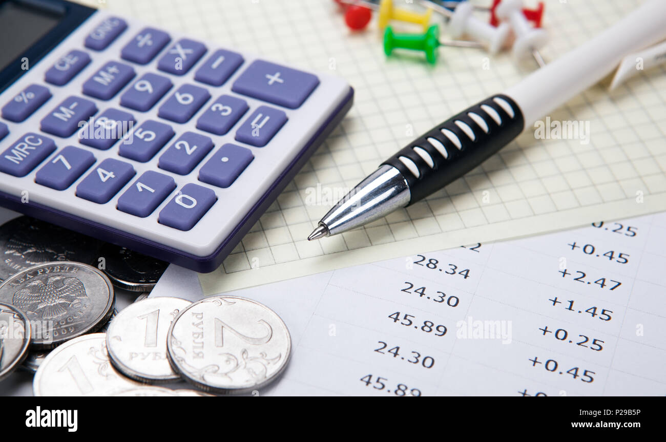 Russian rubles with calculator and a pen and digits closeup Stock Photo ...