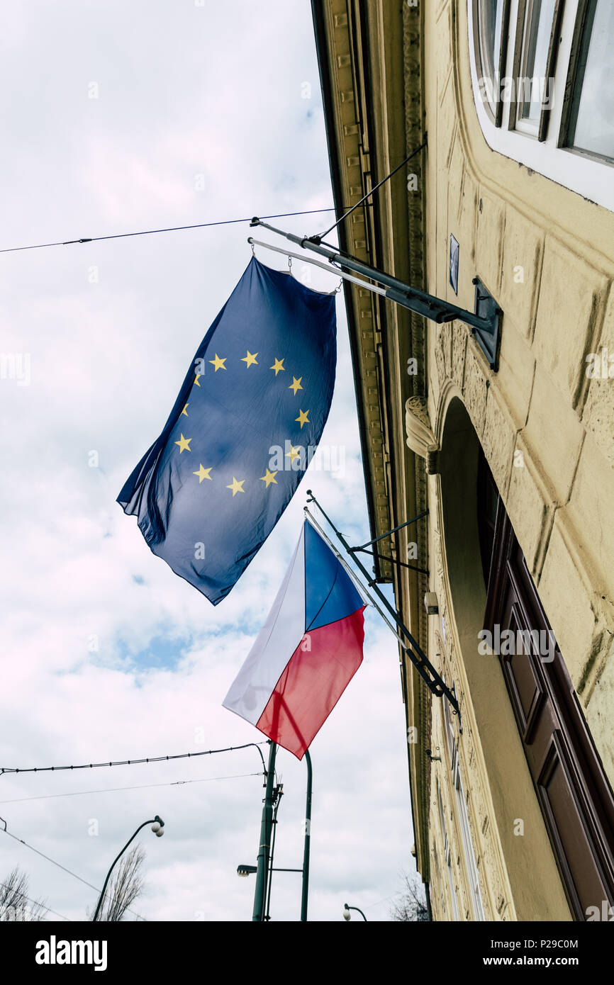Czech Republic flag waving in the air next to the European Union flag ...