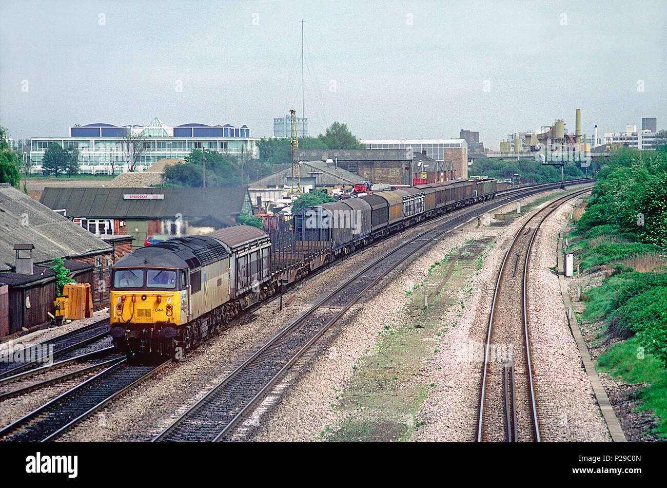 A class 56 diesel locomotive number 56044 working a loaded steel ...