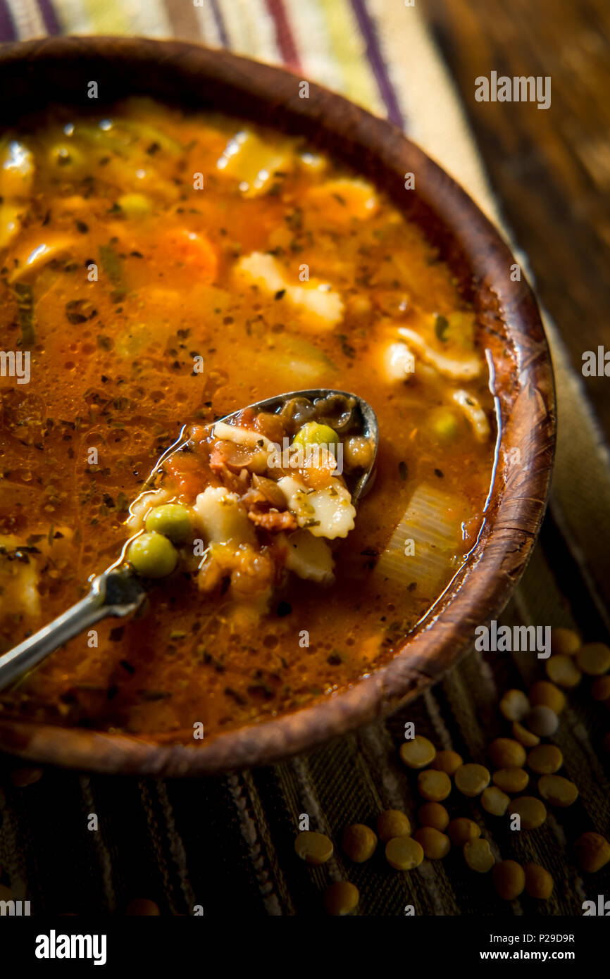 Rustic homecooked hearty tomato vegetable soup in a wooden bowl Stock ...