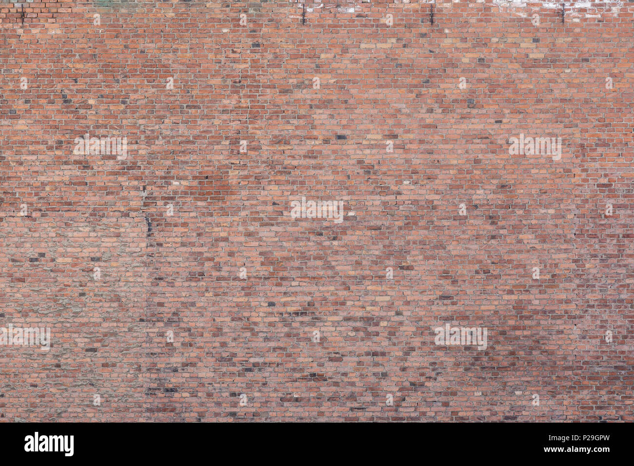 Old messy brick wall texture background exterior Stock Photo - Alamy