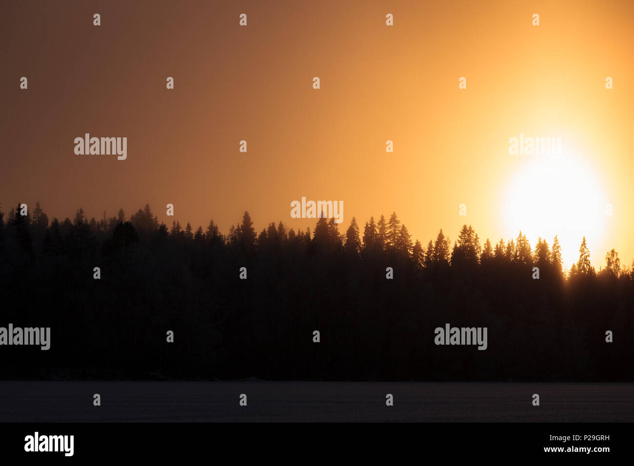 Frozen lake sunset nature landscape Stock Photo - Alamy