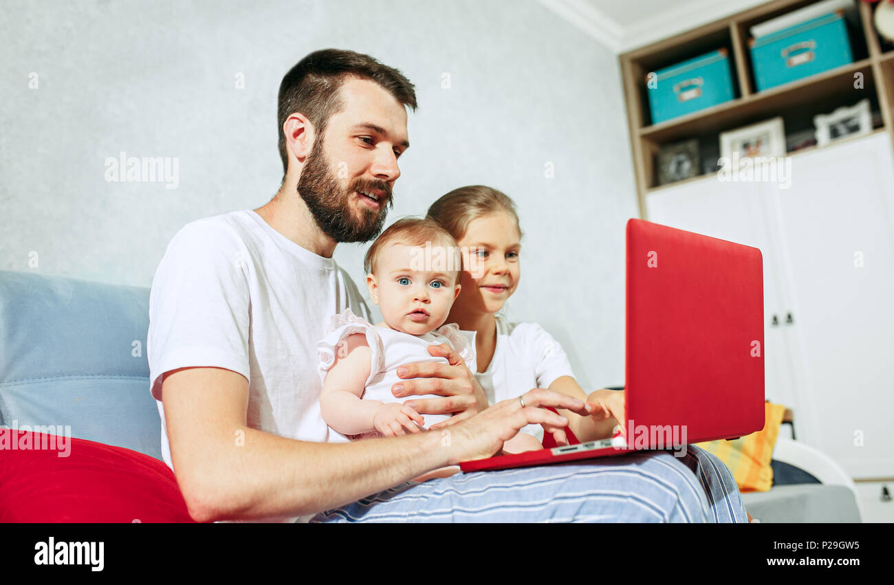 father and his daughters at home Stock Photo - Alamy