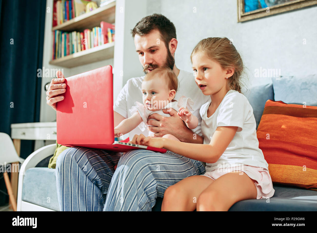 father and his daughters at home Stock Photo - Alamy