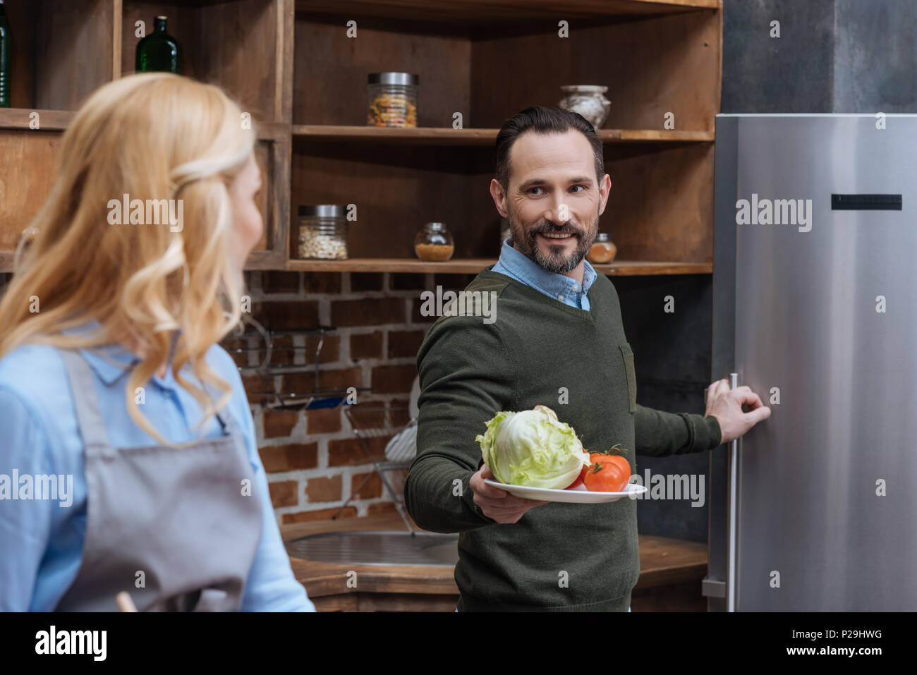 Taking from fridge hi-res stock photography and images - Alamy