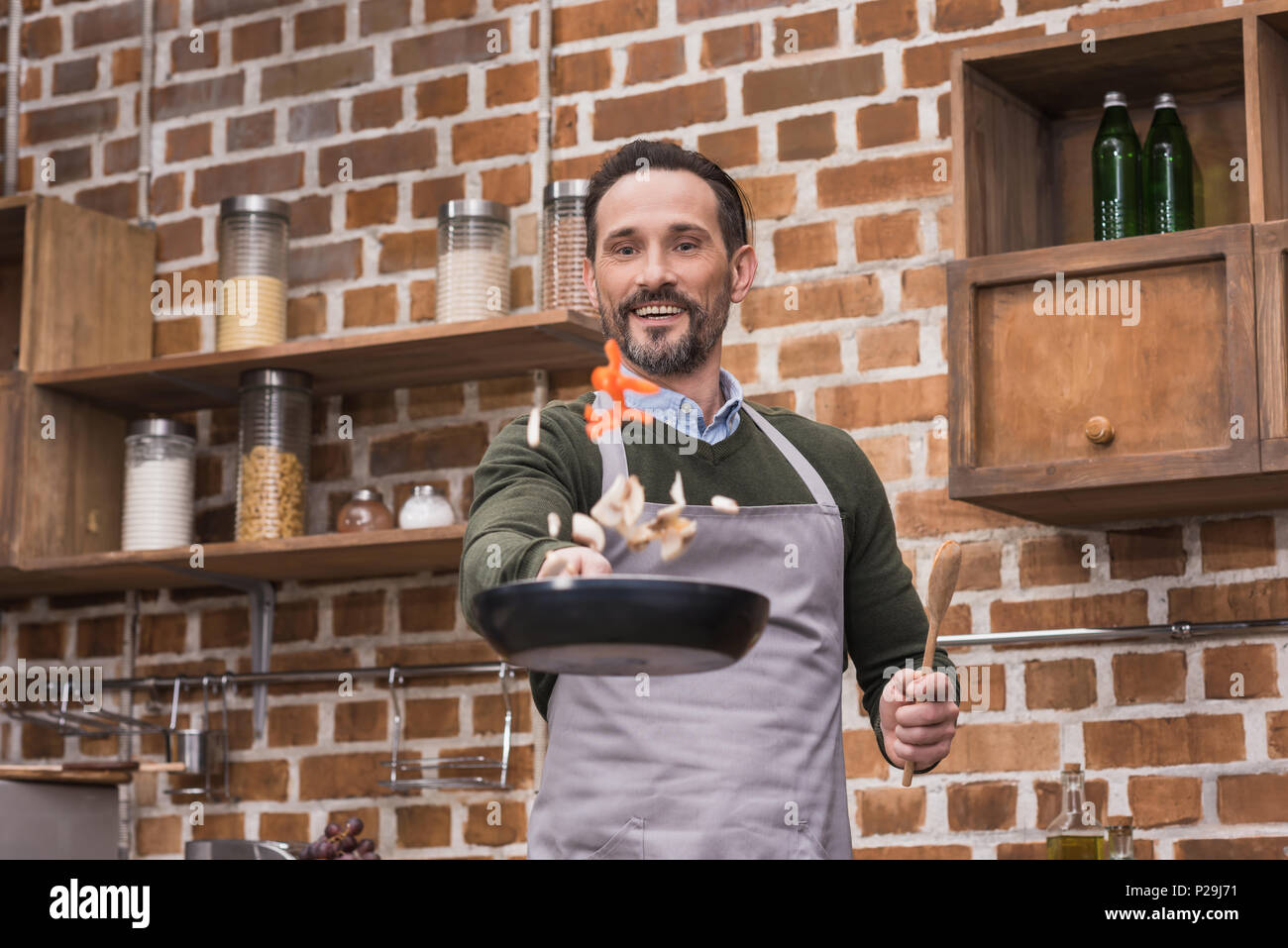 Man tossing hi-res stock photography and images - Alamy