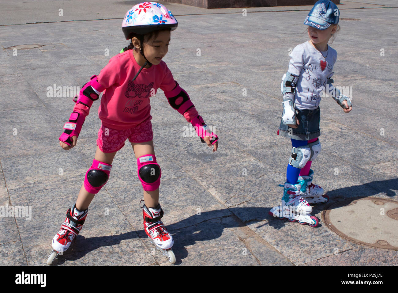 Children roller skating hi-res stock photography and images - Alamy