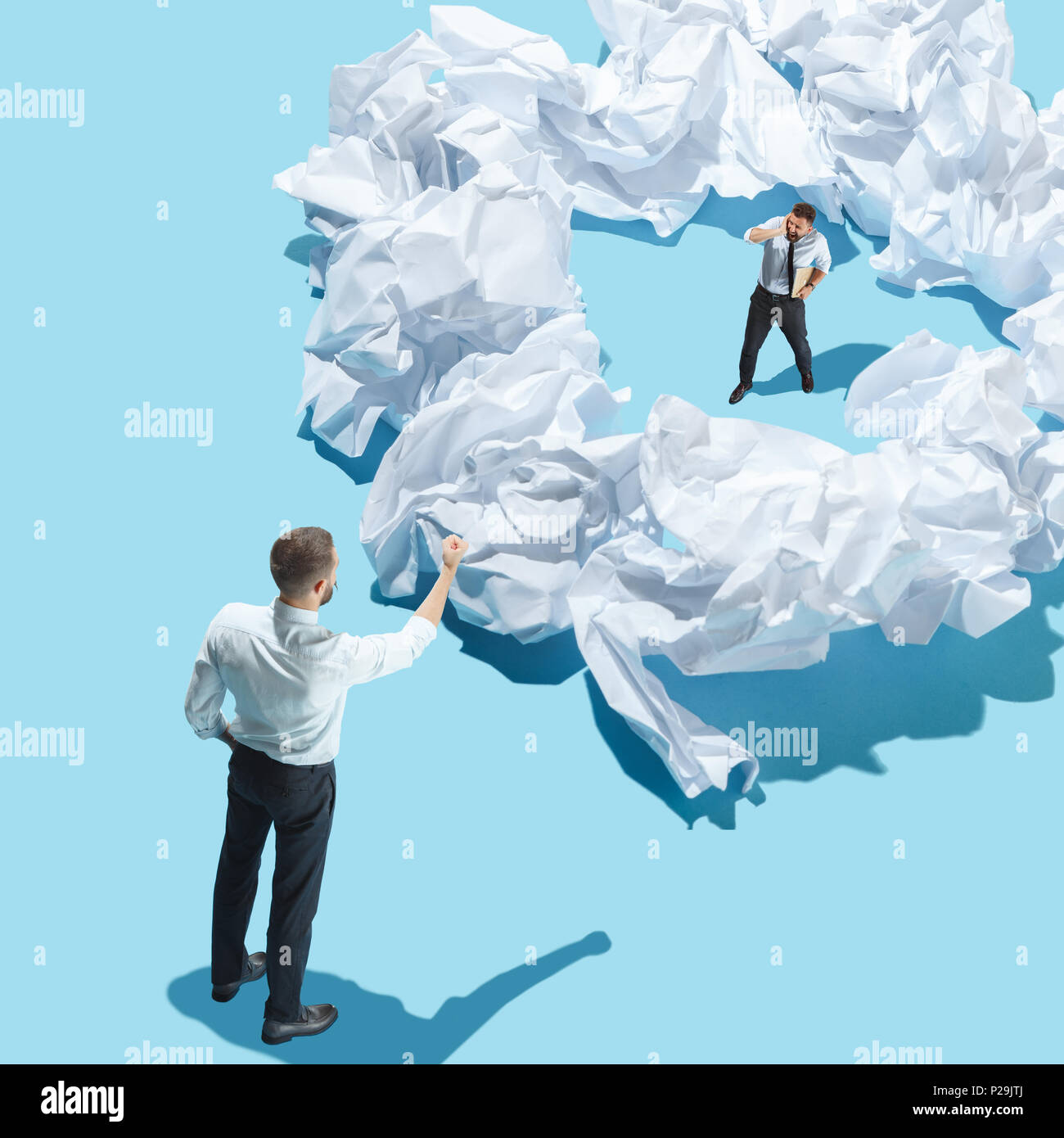 Scared and shocked small businessman under boss pressure Stock Photo ...