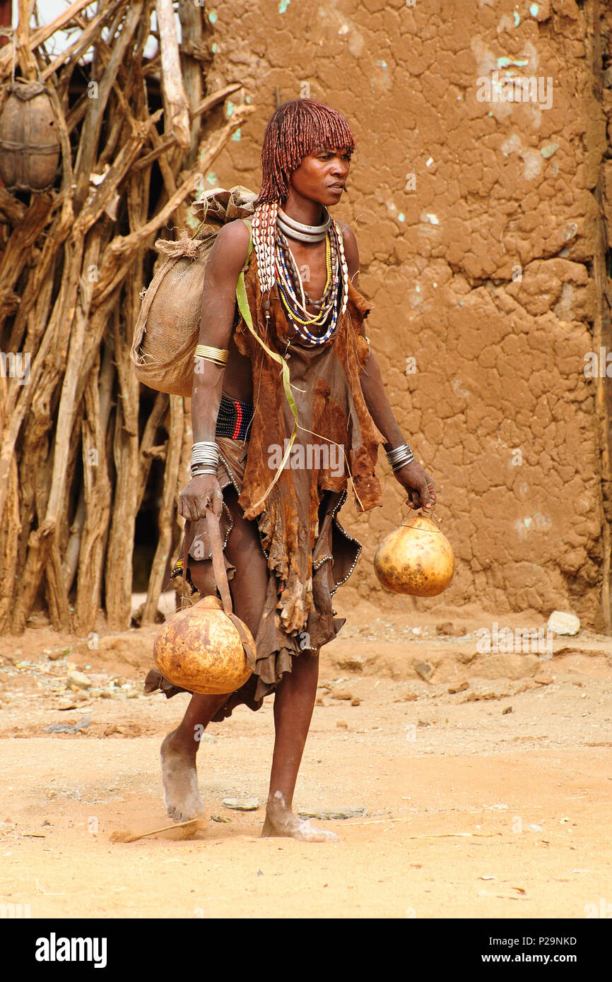TURMI, OMO VALLEY, ETHIOPIA - 29 JULY 2013: Ethiopian people from Hamer ...