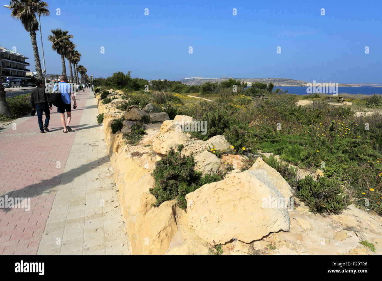 The old Coastal defence wall, Qawra town, Malta Stock Photo - Alamy