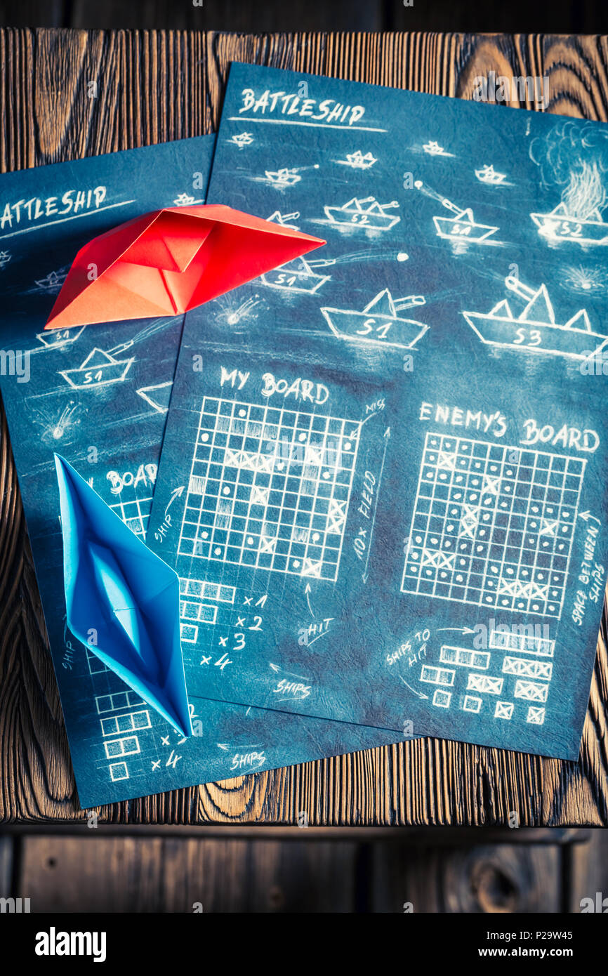 Battleship paper game ready to play and red ship Stock Photo - Alamy