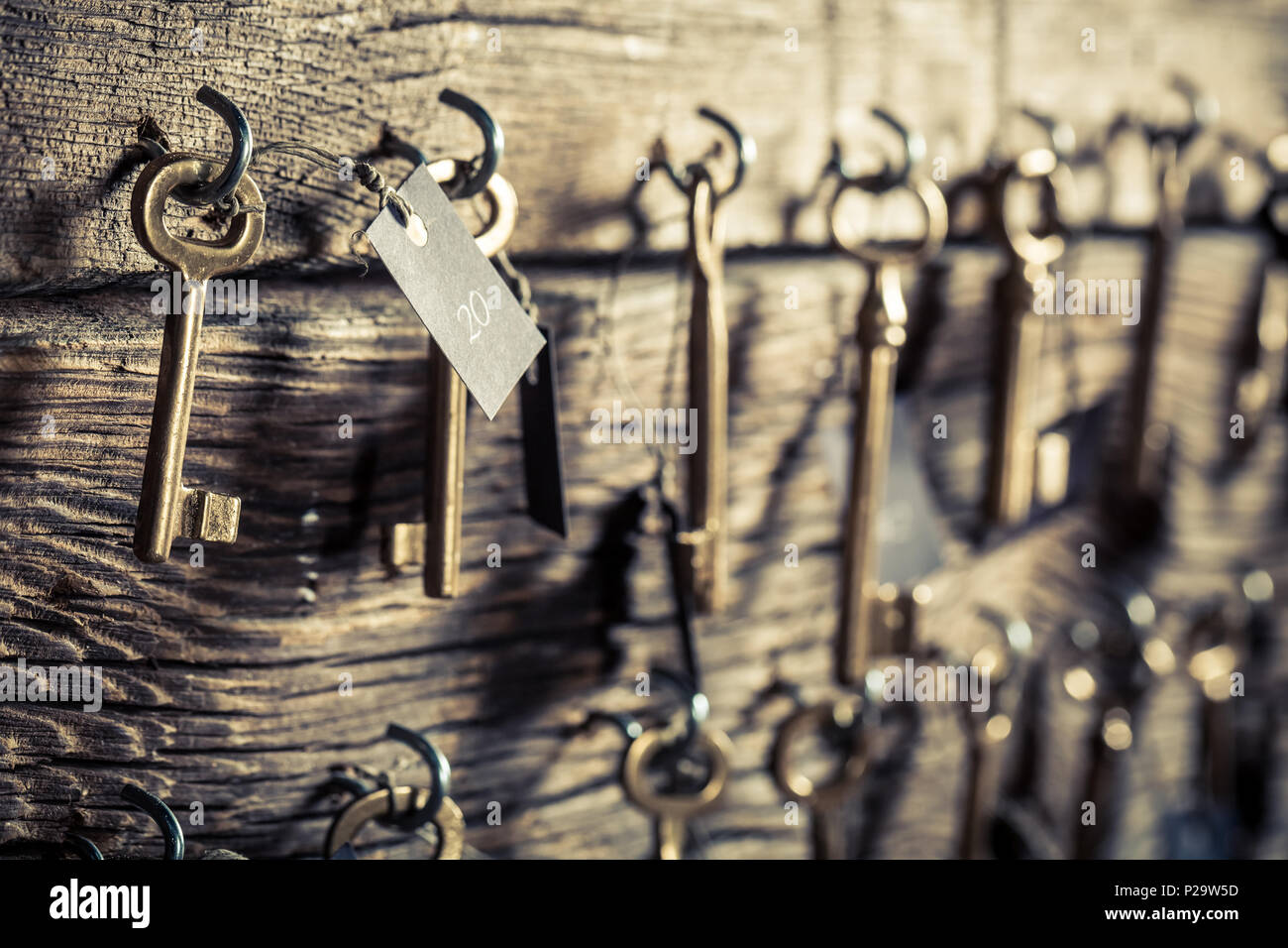 Closeup of old keys for hotel rooms Stock Photo - Alamy