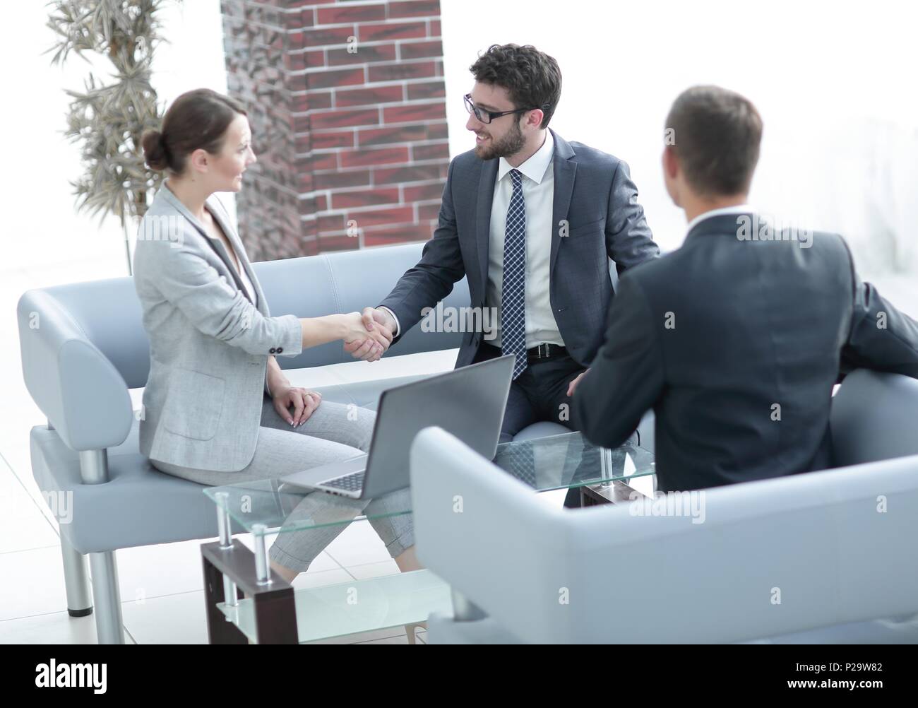 business handshake women with the client Stock Photo - Alamy