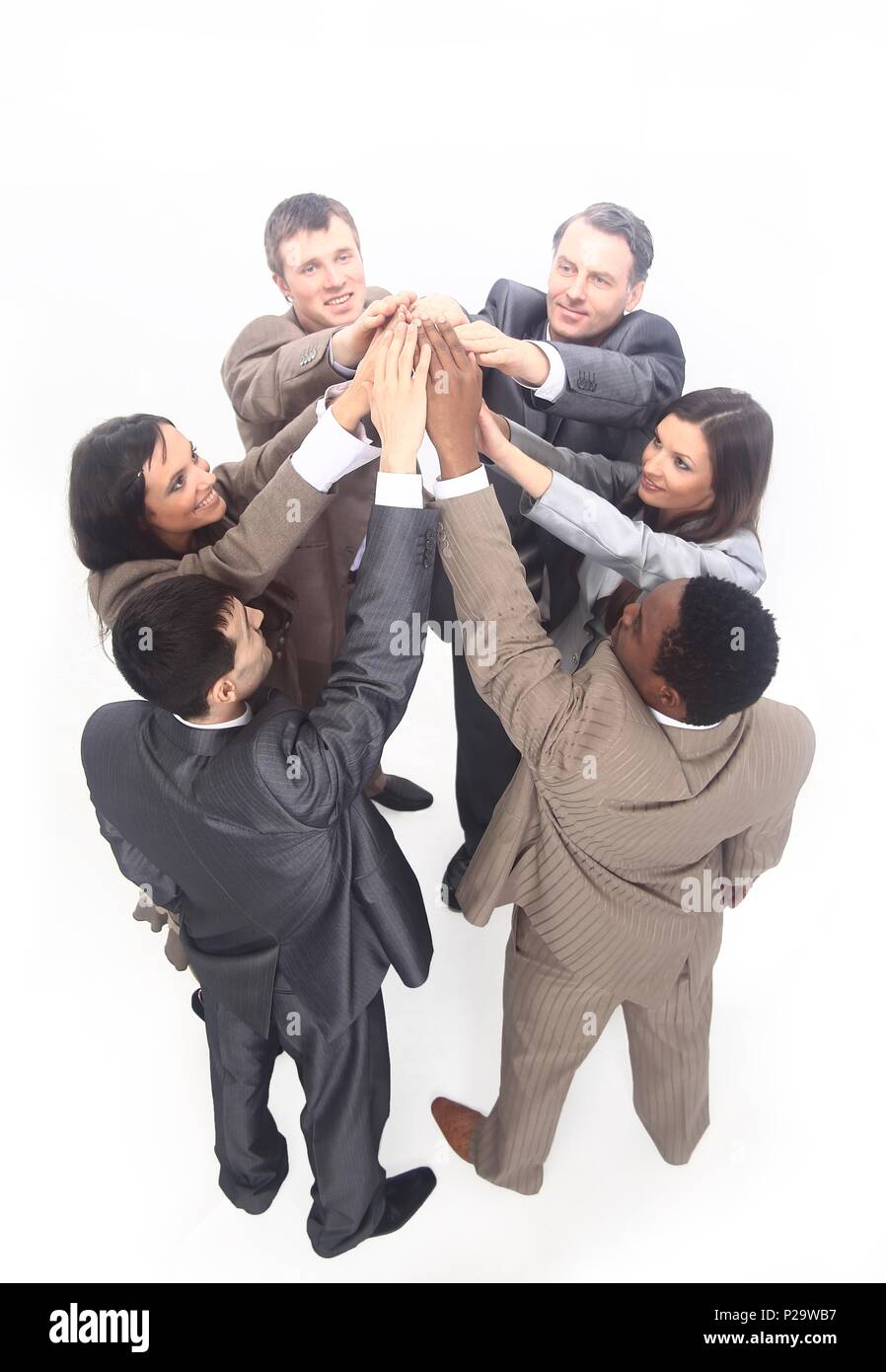 successful business team raising hands together up Stock Photo - Alamy