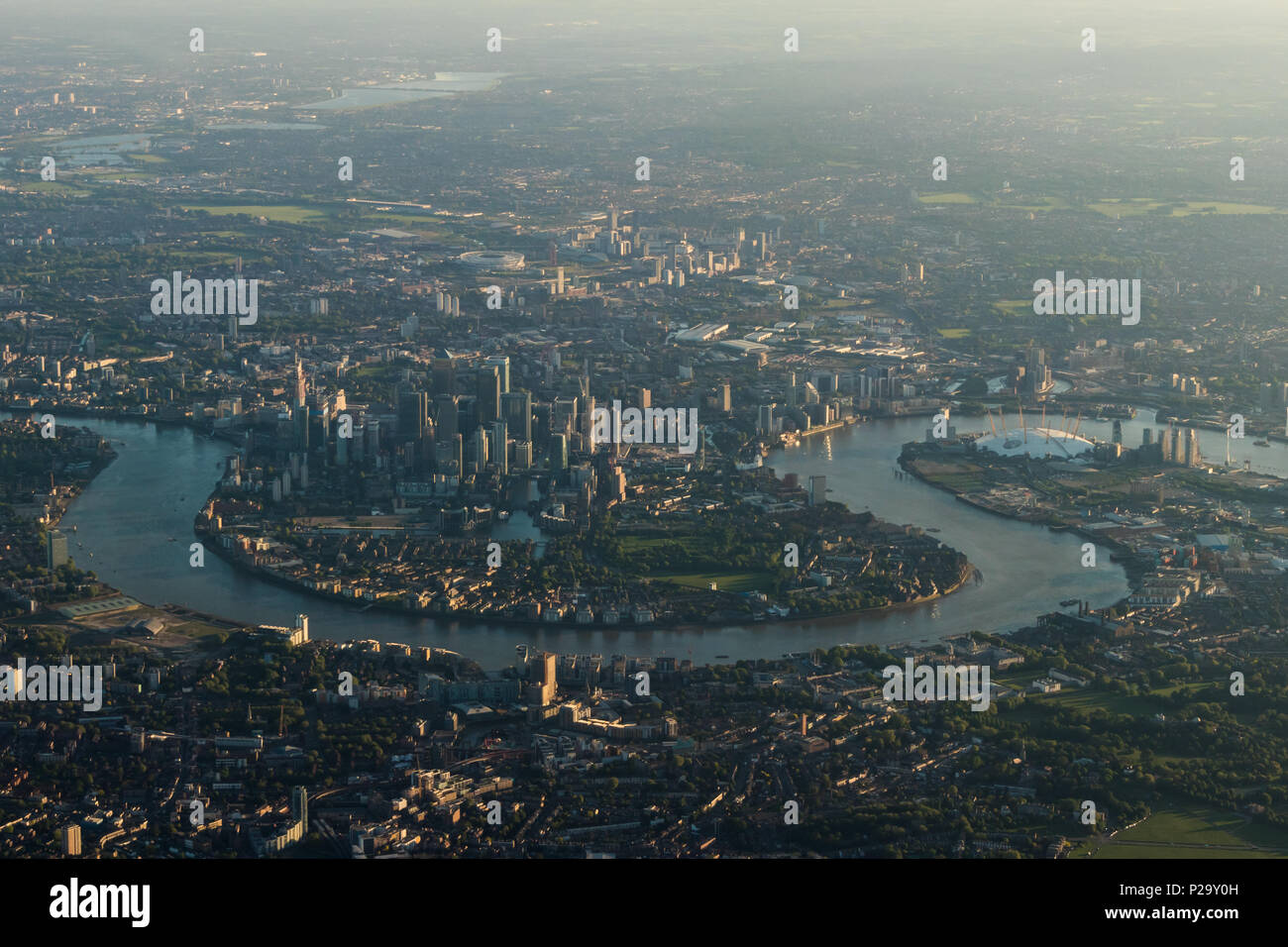Early morning aerial view of the River Thames and Canary wharf, London ...