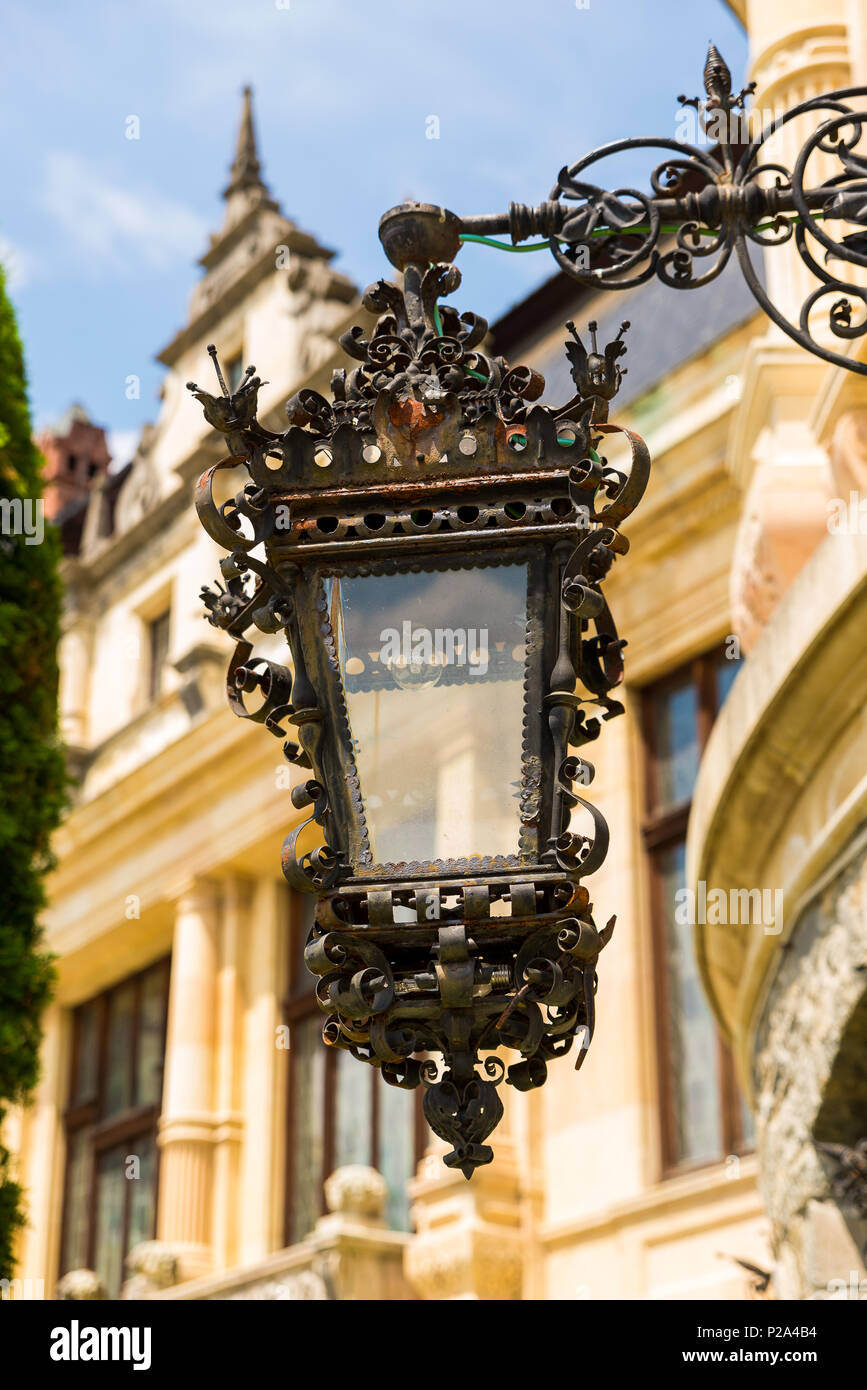 selective focus of a lantern in the castle-palace of Peles, Sinaia ...