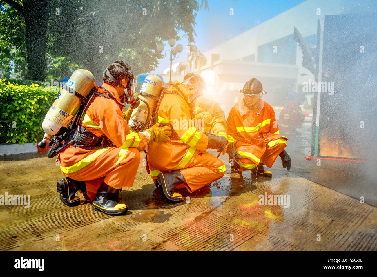 Firefighters are training firefighting methods for industrial workers ...