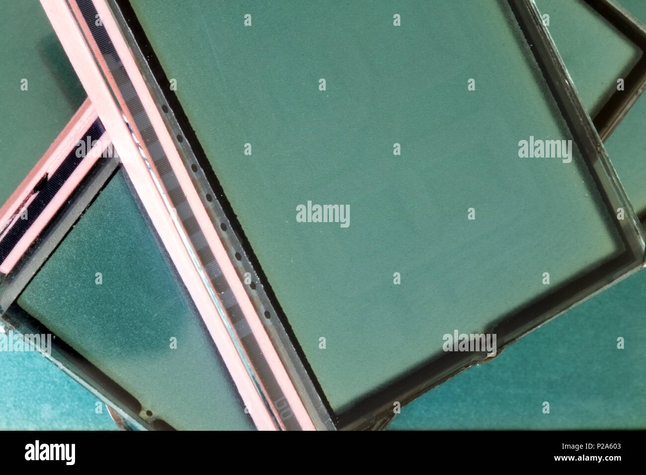 Miniature LCD panels on heap. Many small display for electrical ...