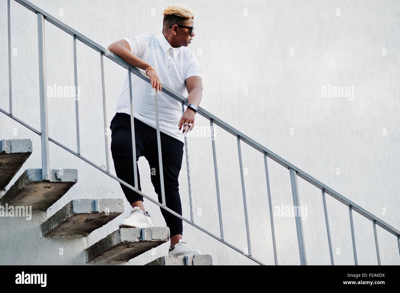 Stylish arabian muslim boy with originally hair and sunglasses posed on ...