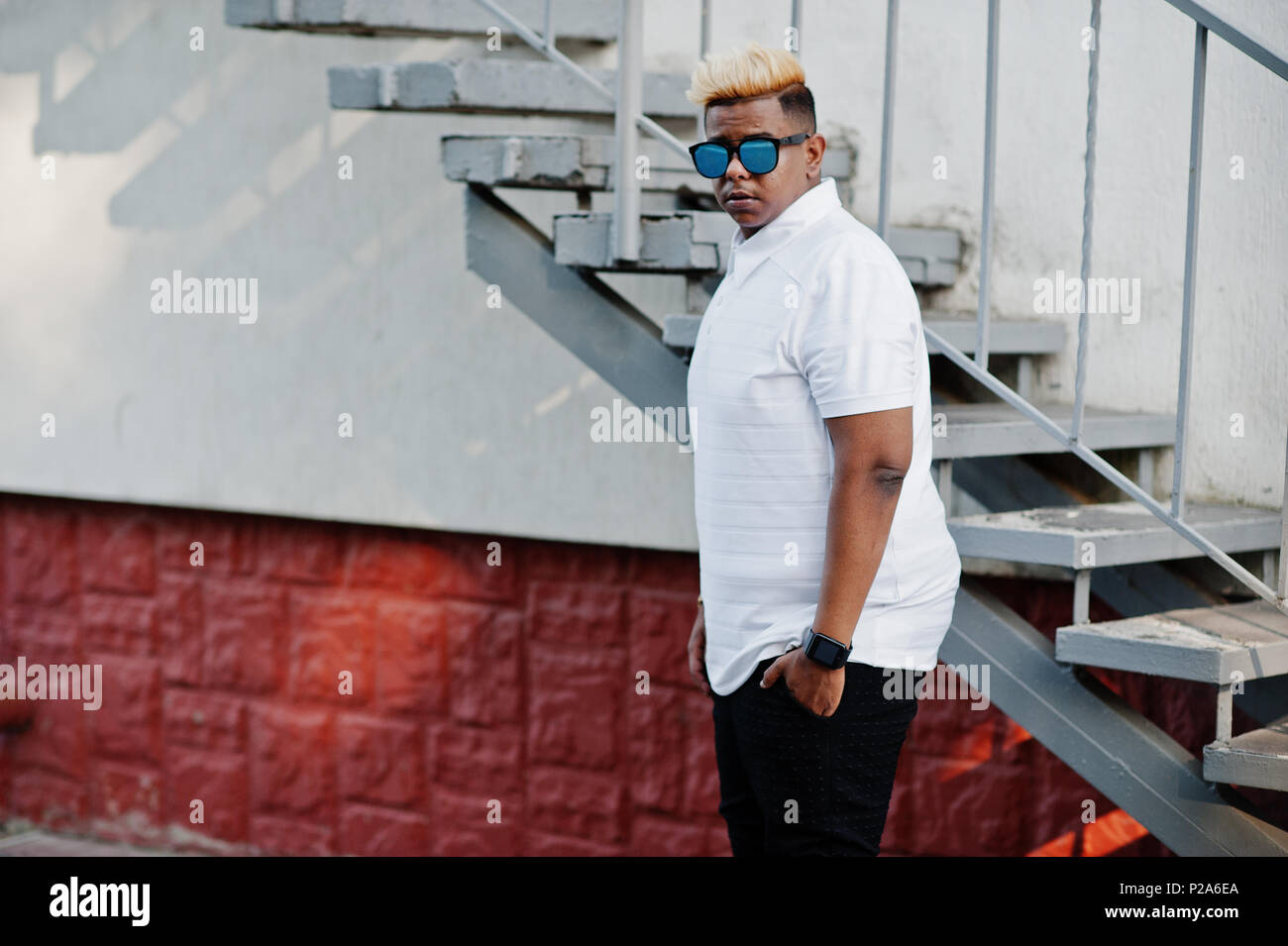 Stylish arabian muslim boy with originally hair and sunglasses posed on ...