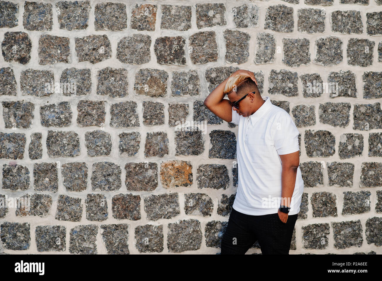 Stylish arabian muslim boy with originally hair and sunglasses posed on ...