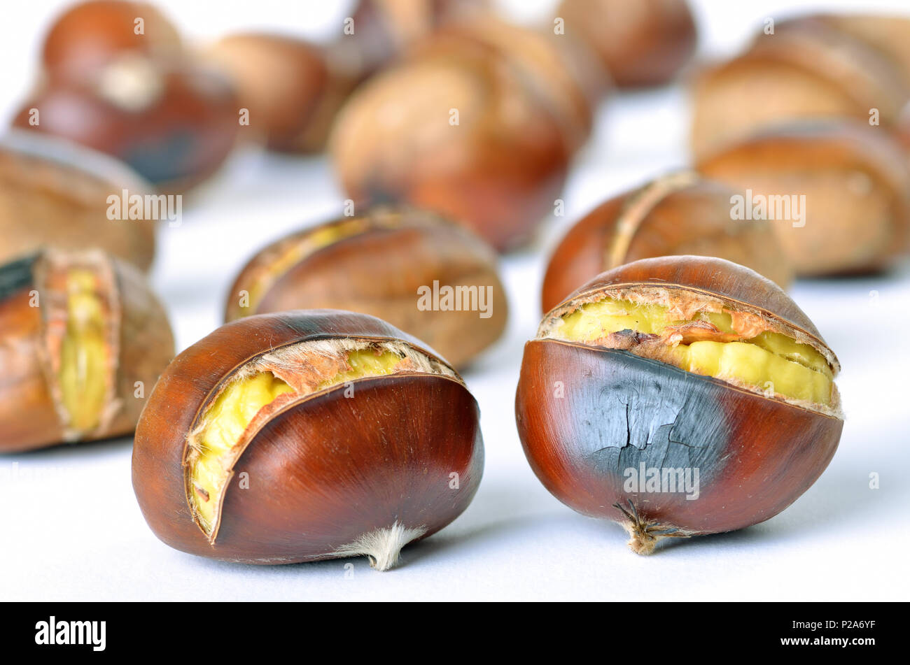 Delicious roasted chestnuts / white background Stock Photo - Alamy
