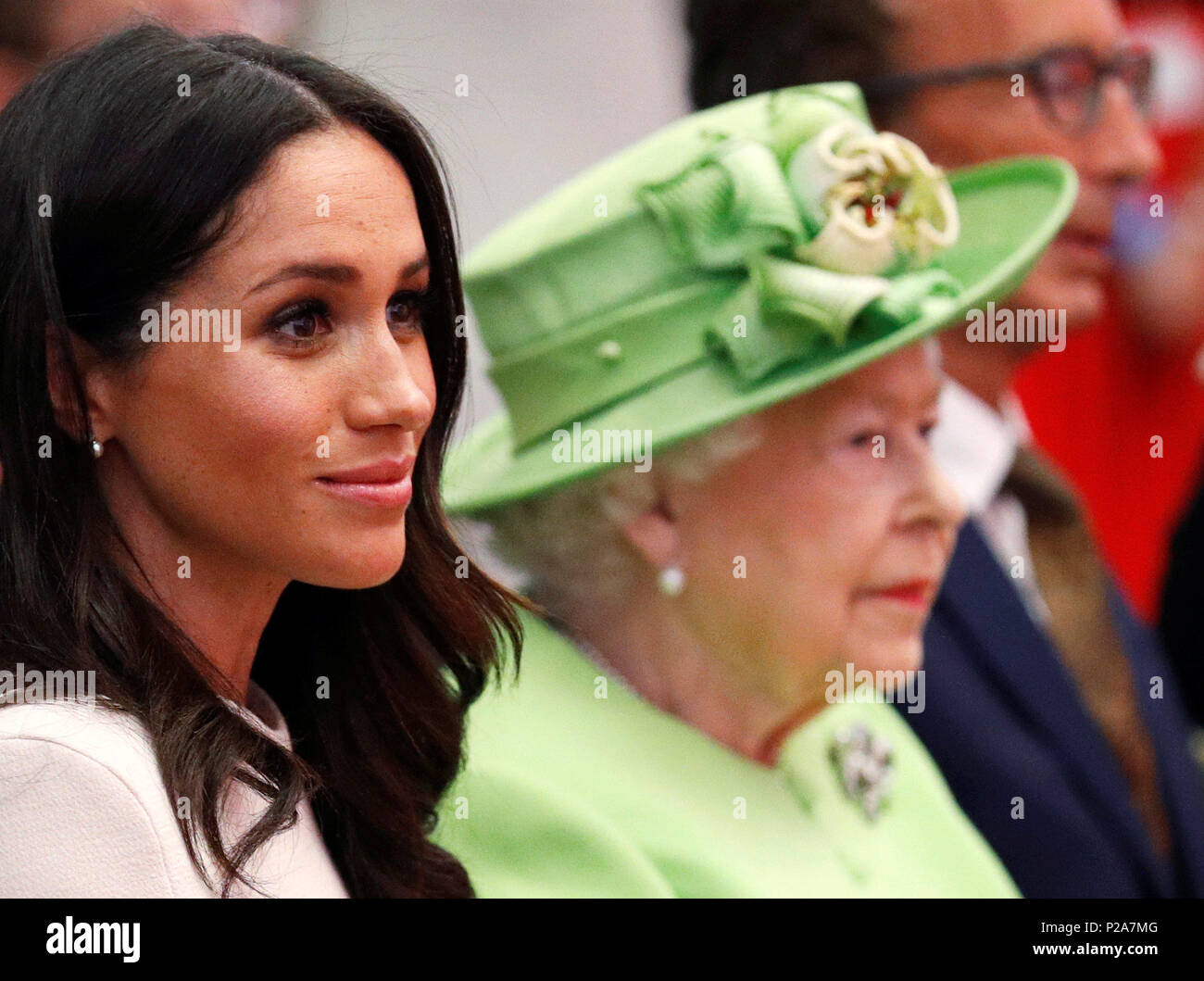 Queen Elizabeth II and the Duchess of Sussex on a tour of the ...