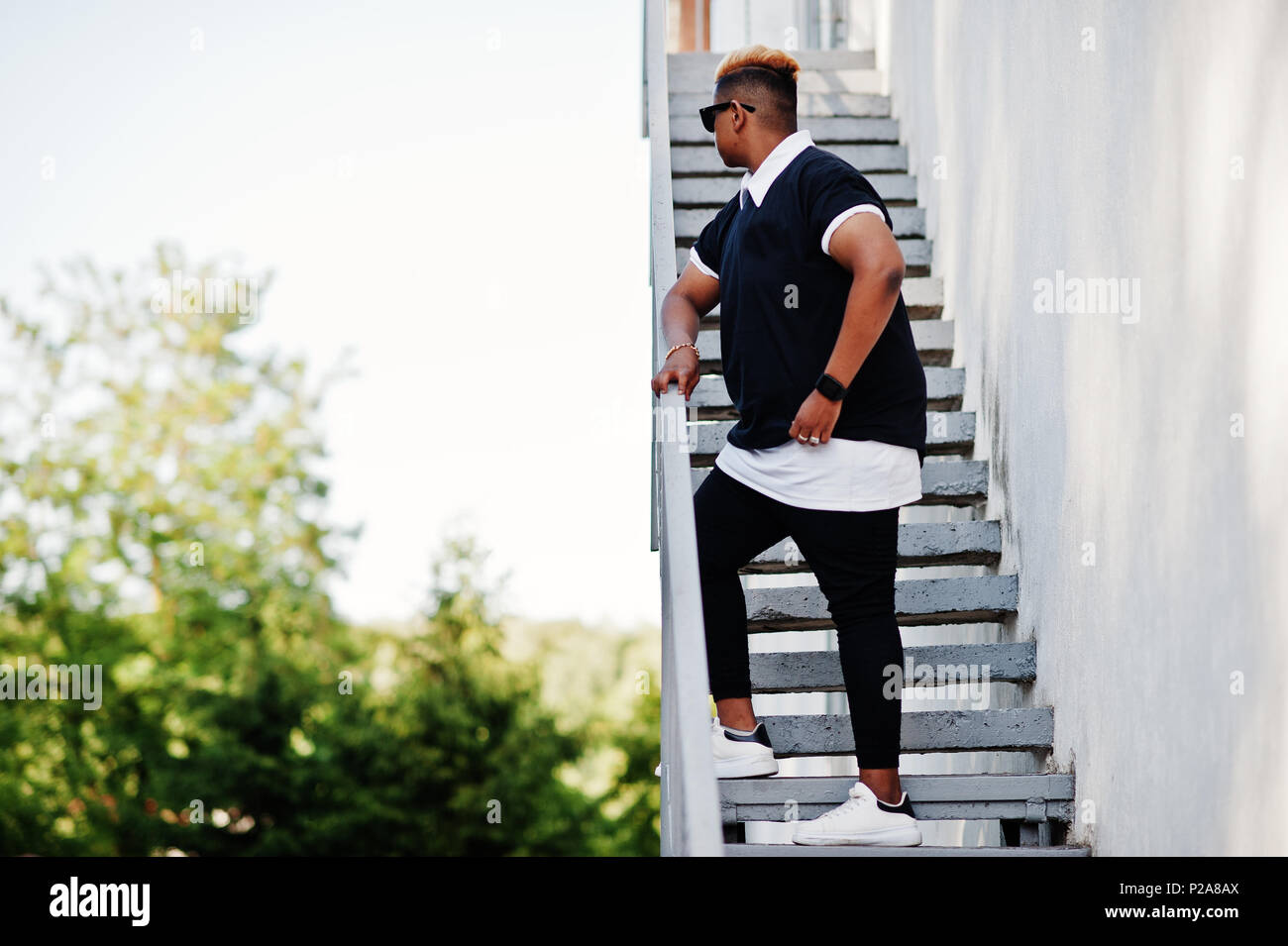 Stylish arabian muslim boy with originally hair and sunglasses posed on ...