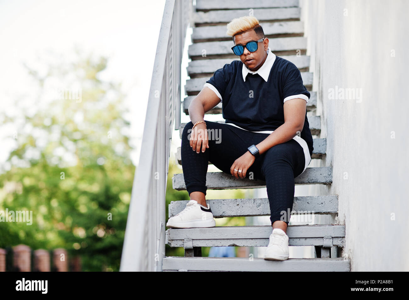 Stylish arabian muslim boy with originally hair and sunglasses posed on ...