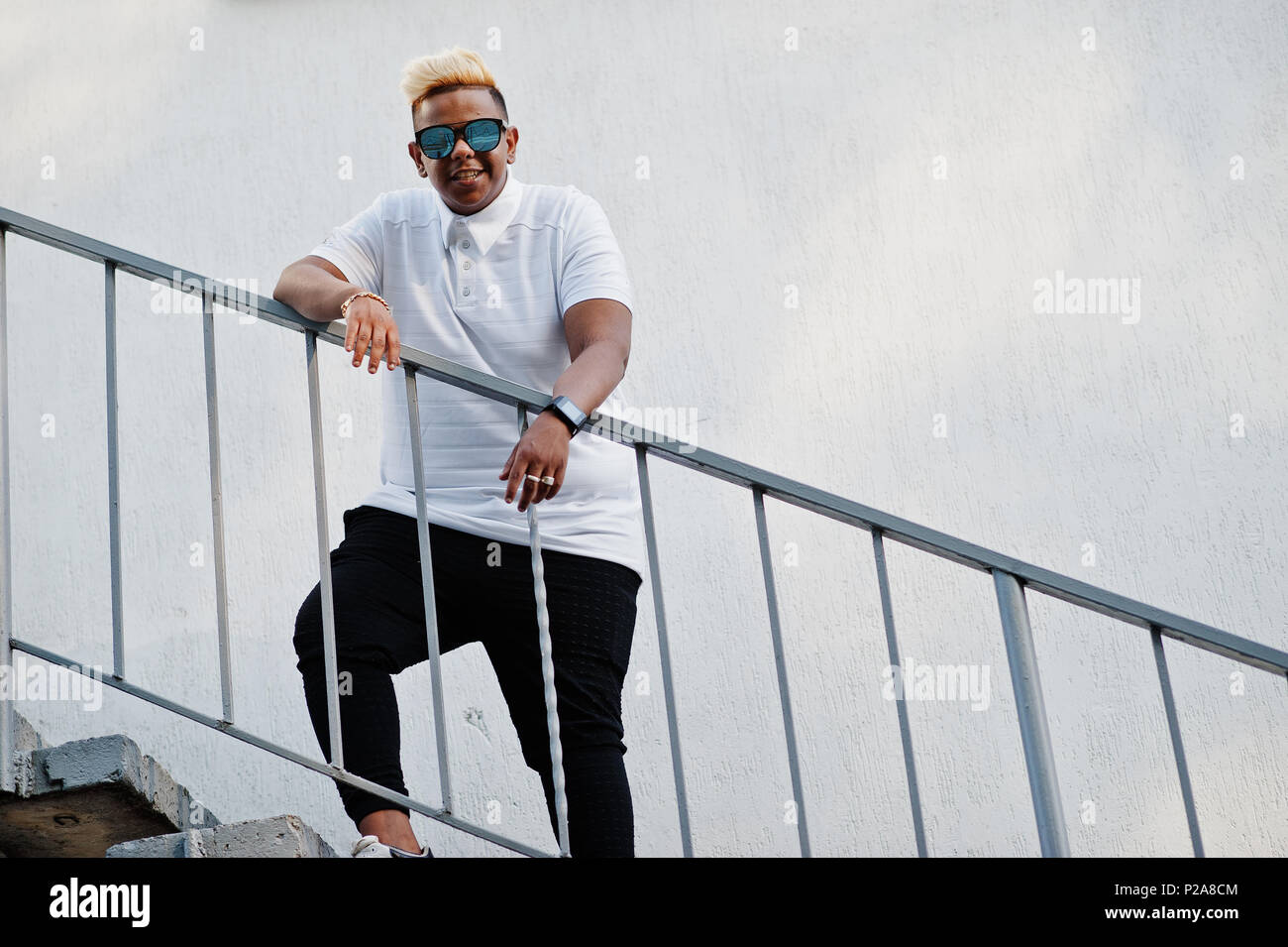 Stylish arabian muslim boy with originally hair and sunglasses posed on ...