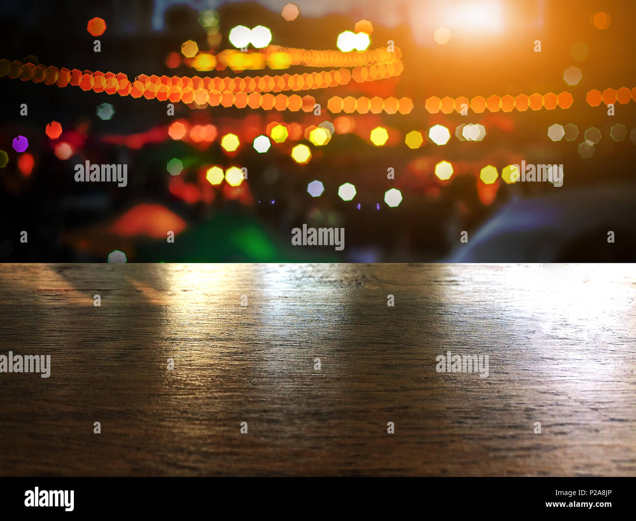 Wooded table and beautiful background montage Stock Photo - Alamy