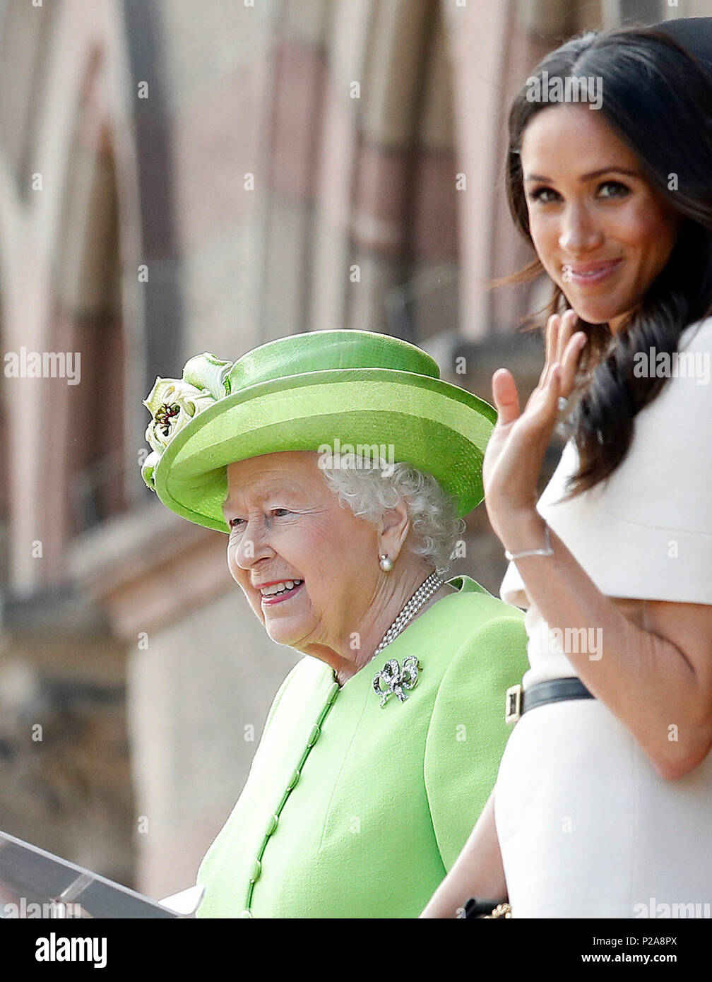 Queen Elizabeth II and the Duchess of Sussex on the steps of Chester ...