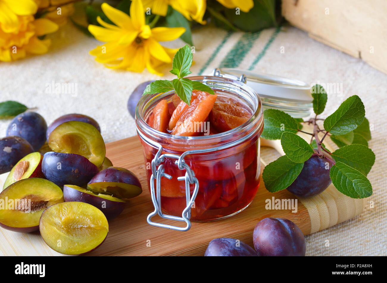 Plum compote and fresh plums Stock Photo - Alamy