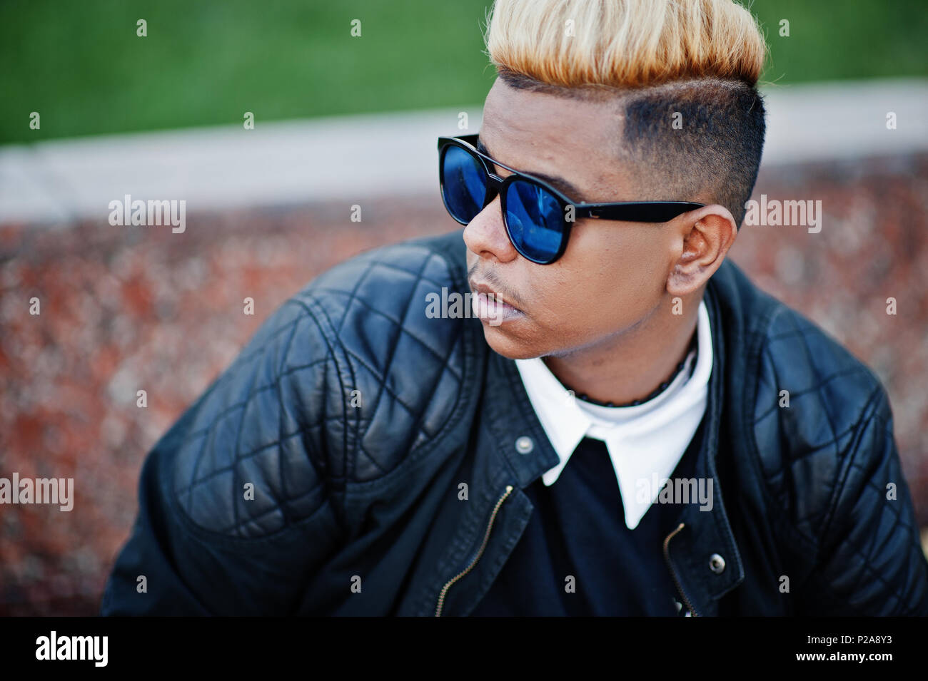 Stylish arabian muslim boy with originally hair and sunglasses posed on ...