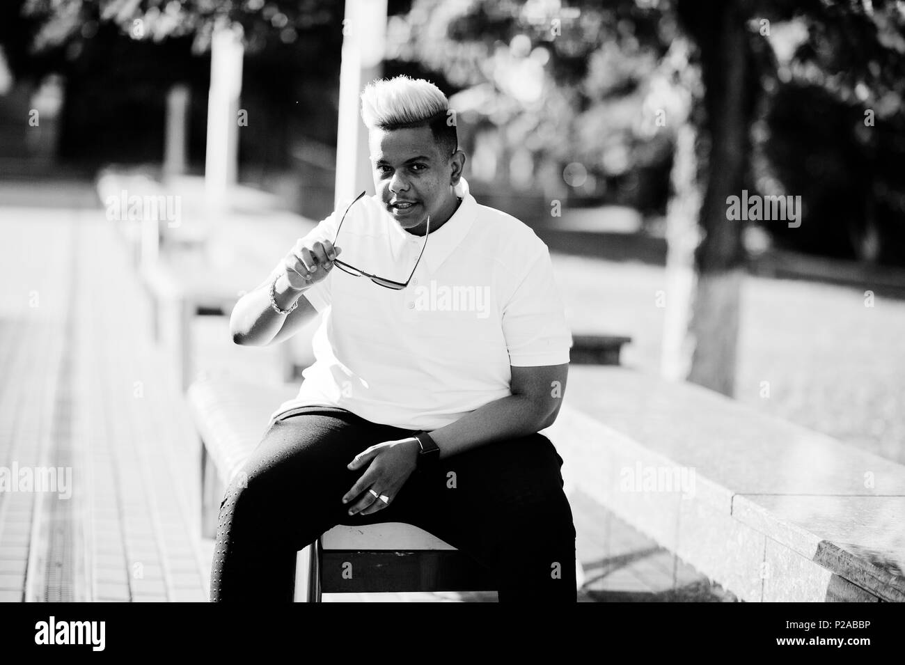 Stylish arabian muslim boy with originally hair posed on streets Stock ...