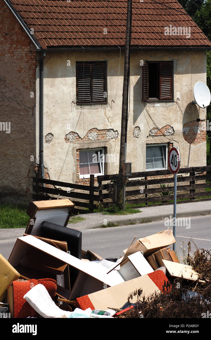 Old house with pile of dumped garbage across the street Stock Photo - Alamy