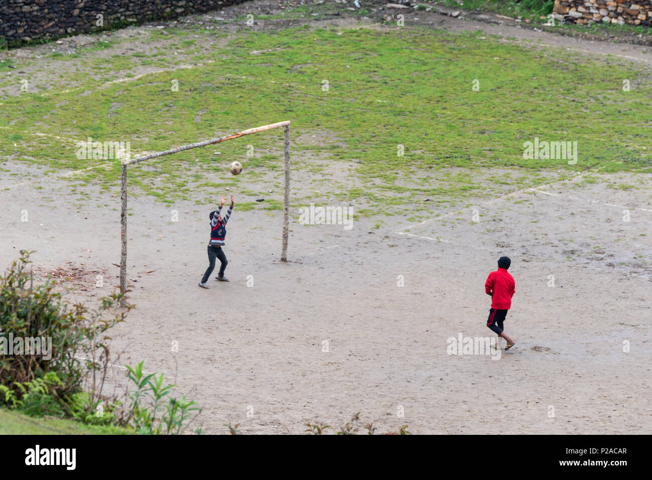 Asian kids playing football hi-res stock photography and images - Alamy