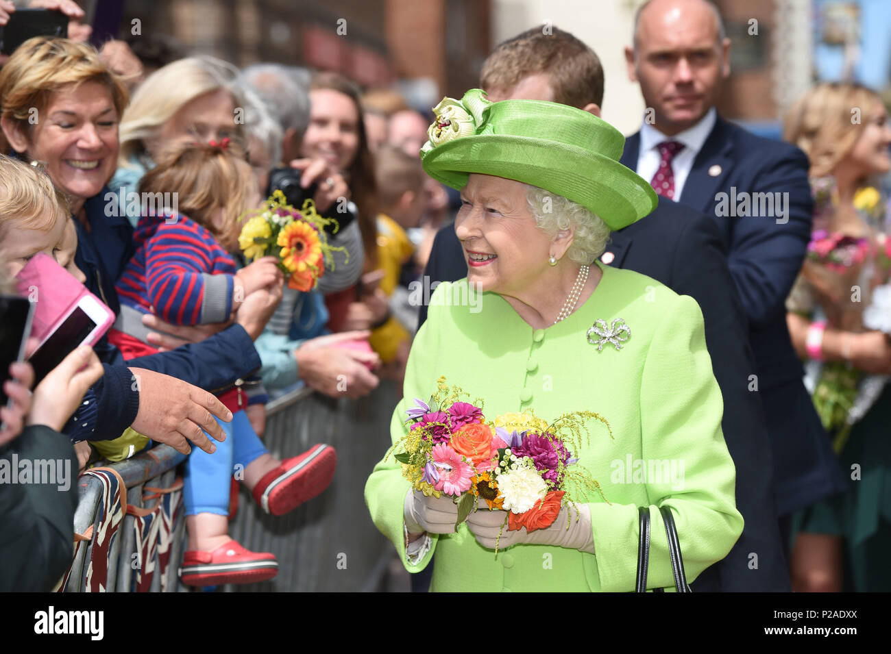 Queen Elizabeth II meets the crowds during a walk about in Chester ...
