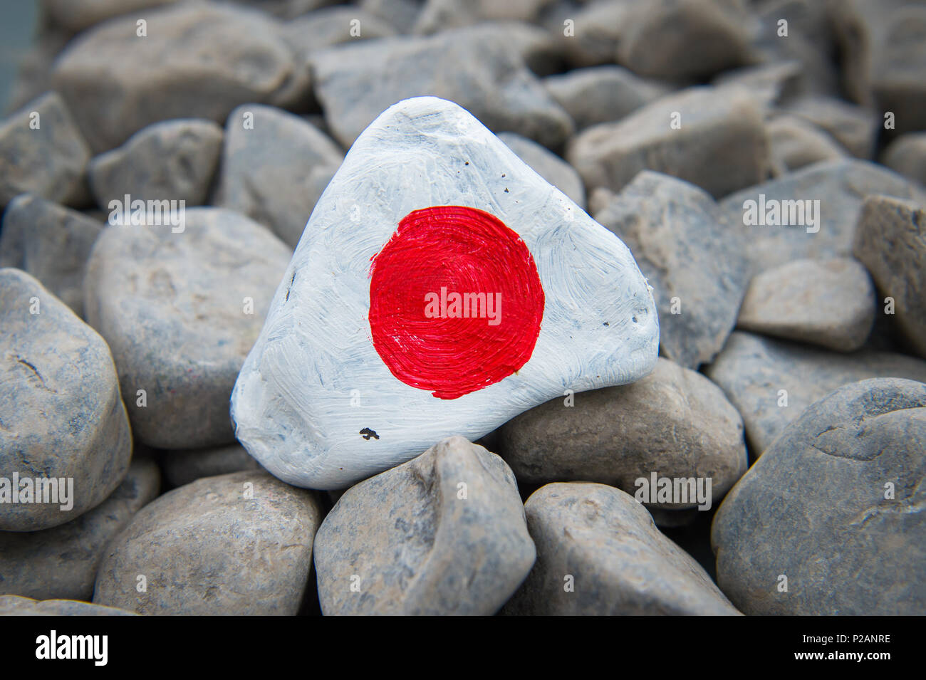 A stone painted by three year old Luke Wilkinson of Mossley, Greater ...