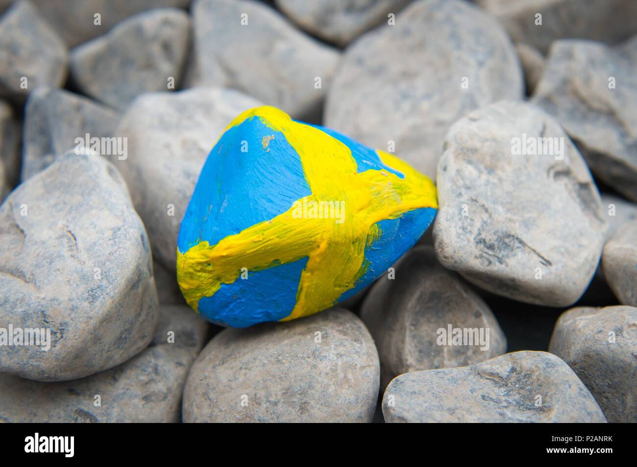 A stone painted by three year old Luke Wilkinson of Mossley, Greater ...