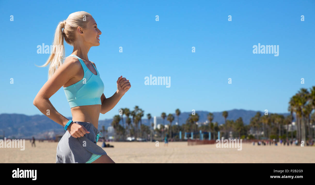 Woman fitness tracker running hi-res stock photography and images - Alamy